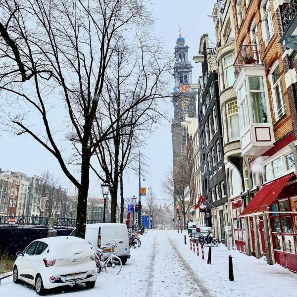 Snow and frozen canals in Amsterdam - Winter 2021 | Velvet Escape