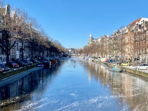 Snow and frozen canals in Amsterdam - Winter 2021 | Velvet Escape