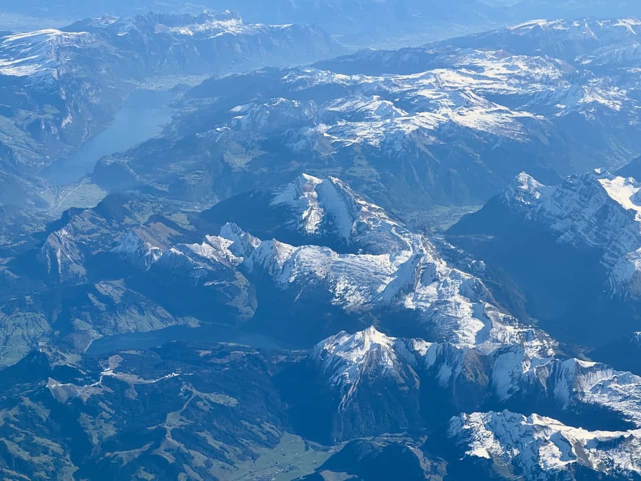 Views of the Swiss Alps and Lago Maggiore from a plane window